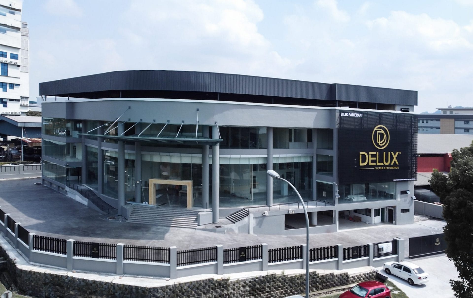 DELUX Holdings Moves to the Largest Autogate and Security Door Showroom ...